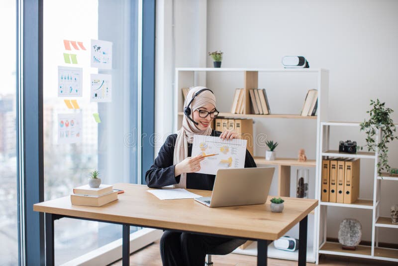 Employee Decoding Charts on Online Briefing Using Devices Stock Image ... Employee Decoding Charts on Online Briefing Using Devices Stock Image ...