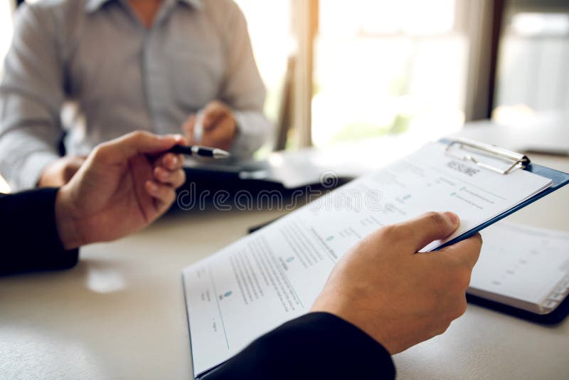 Employee is Describing the Work Experience in the Resume Paper for the ...