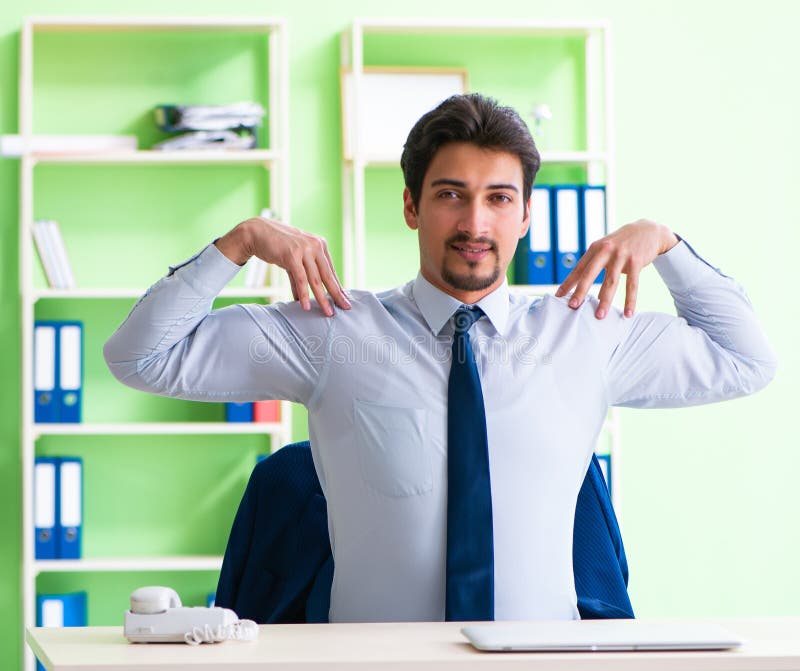 Employee Doing Exercises during Break at Work Stock Photo - Image of ...