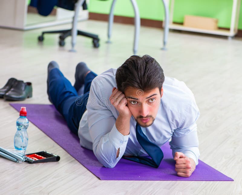 Employee Doing Exercises during Break at Work Stock Image - Image of ...
