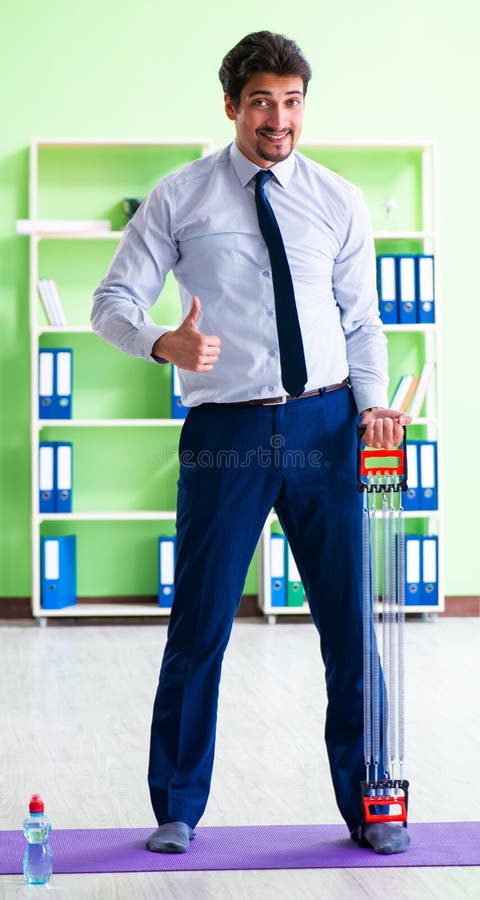 Employee Doing Exercises during Break at Work Stock Photo - Image of ...
