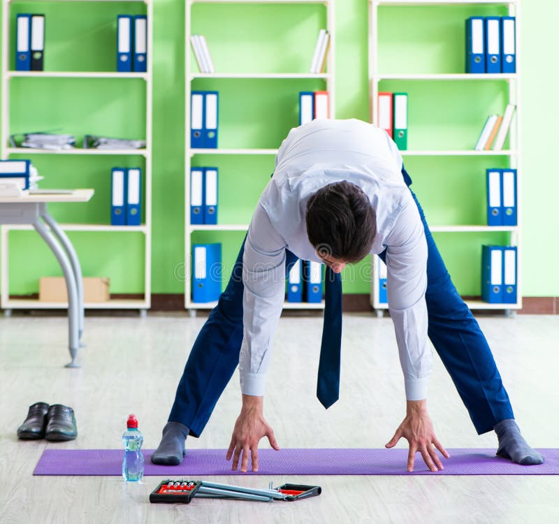 Employee Doing Exercises during Break at Work Stock Image - Image of ...