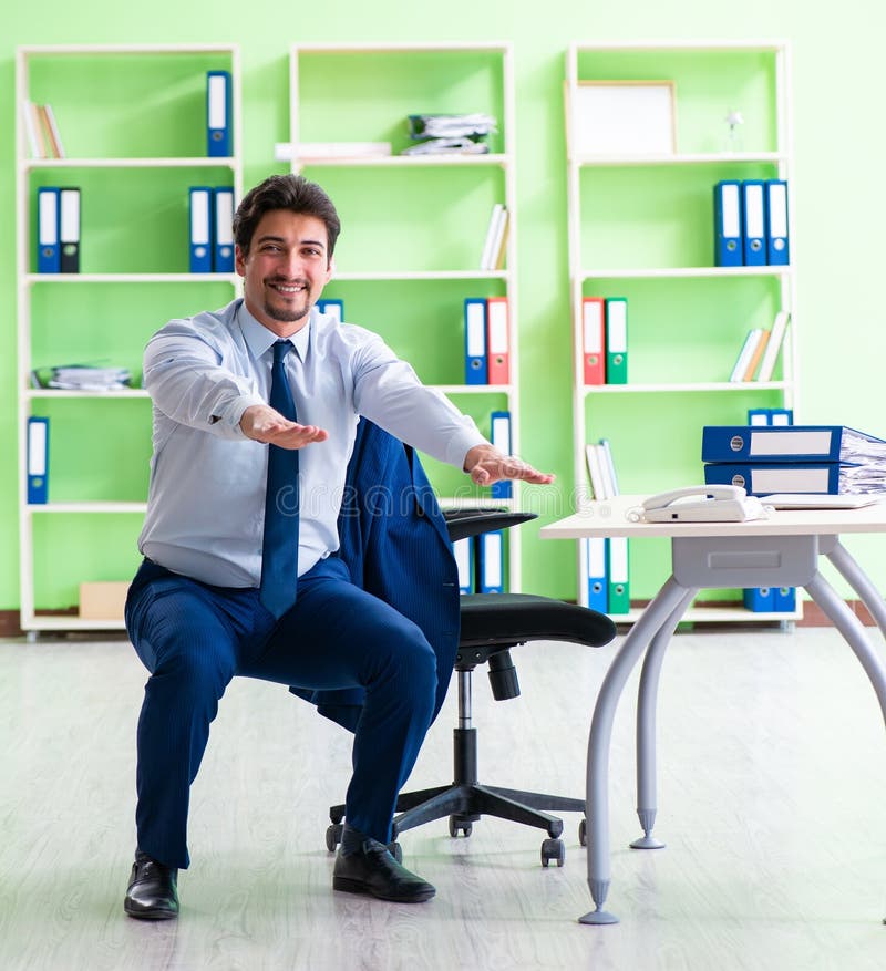 Employee Doing Exercises during Break at Work Stock Image - Image of ...