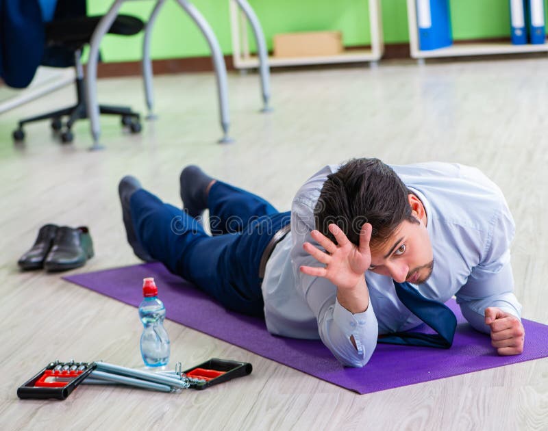 Employee Doing Exercises during Break at Work Stock Image - Image of ...