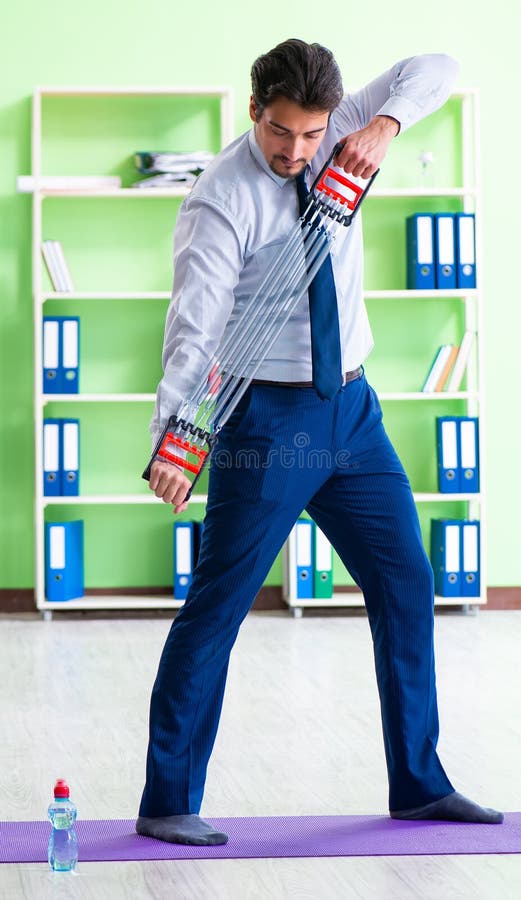 Employee Doing Exercises during Break at Work Stock Image - Image of ...