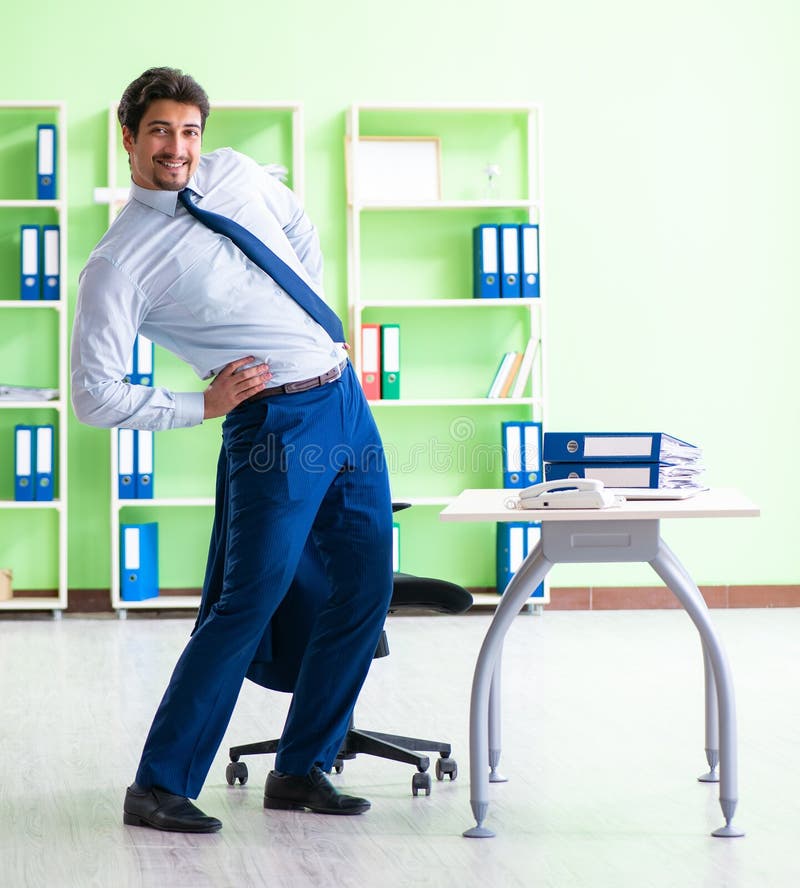 Employee Doing Exercises during Break at Work Stock Image - Image of ...