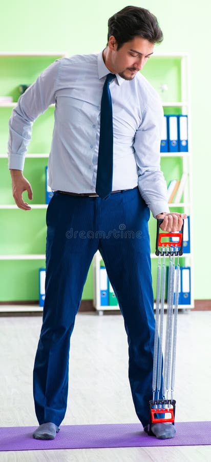 Employee Doing Exercises during Break at Work Stock Photo - Image of ...