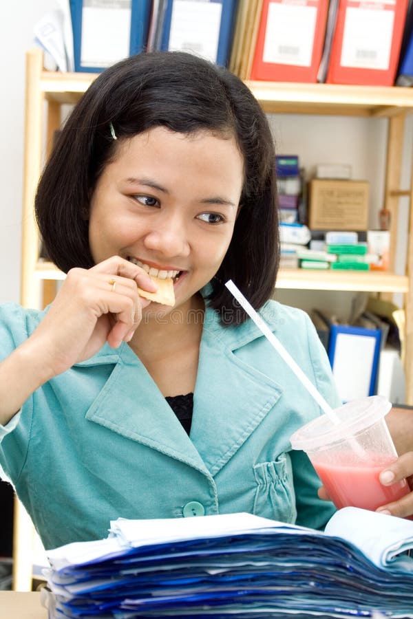 Employee Eat and Drink at Work Stock Image - Image of female, eating ...
