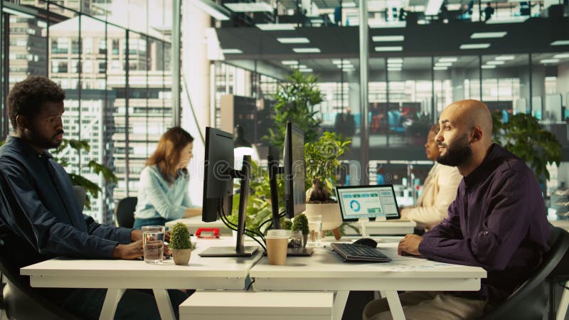Employee Editing Documents on Desktop Computer at Office Desk Stock ...