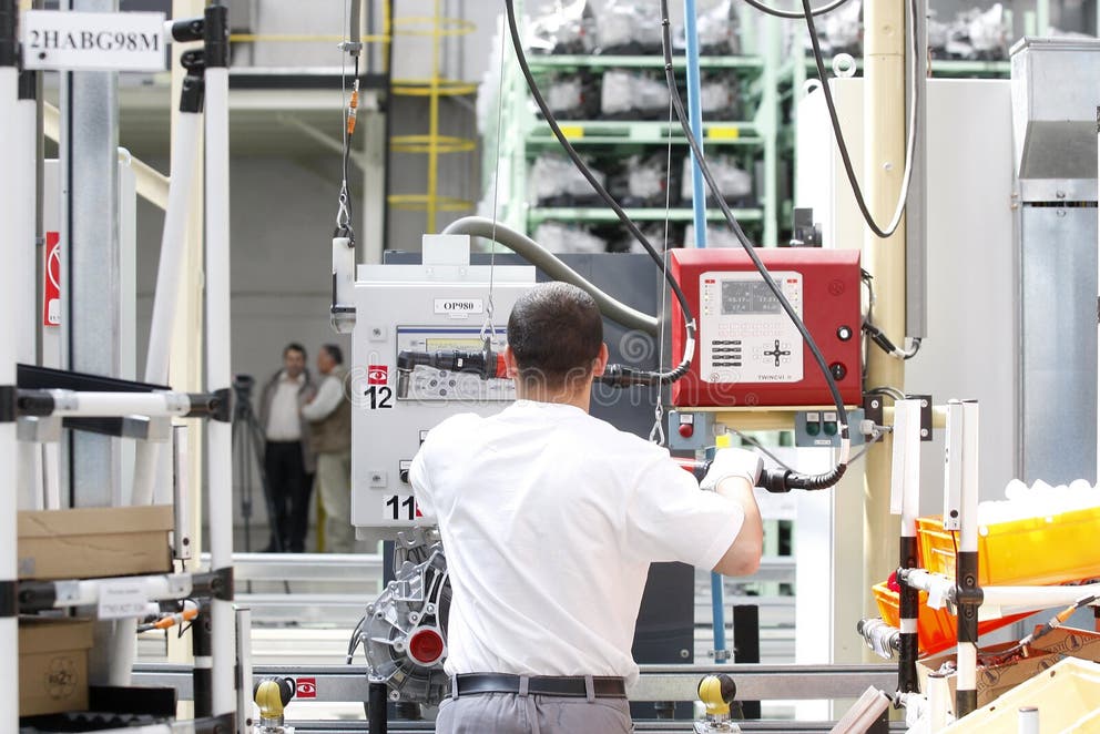 Employee in factory editorial image. Image of assembly - 27917795