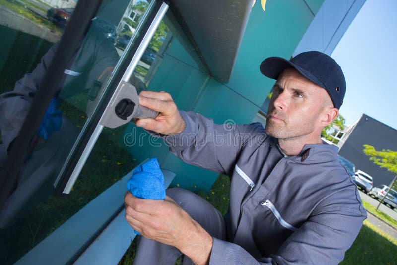 Employee Hand Cleaning Glass Stock Image - Image of company, tools ...