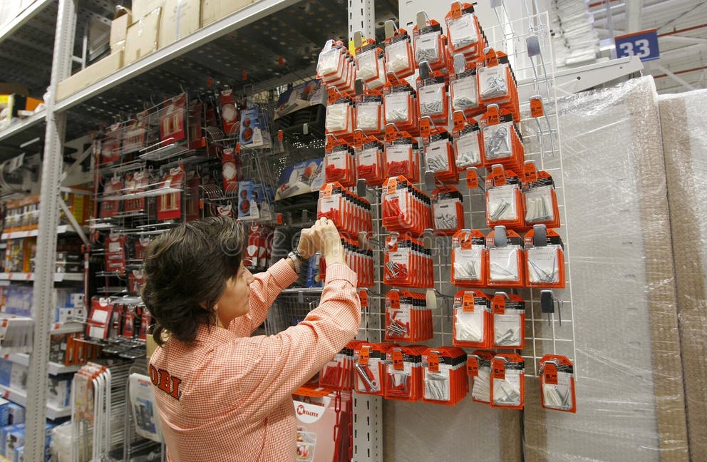 Employee in hardware store editorial image. Image of distribution ...