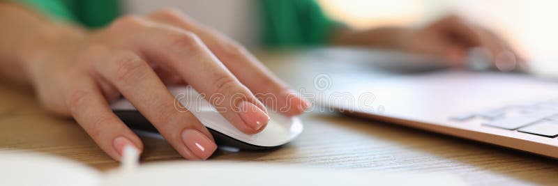 Employee Holds Computer Mouse in Her Hand while Working at Office Desk ...