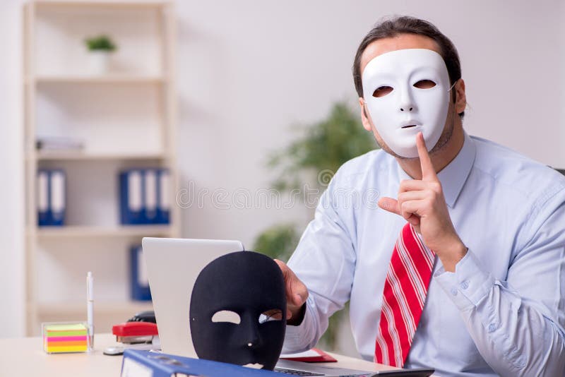 Male Employee with Mask in Hipocrisy Concept Stock Image - Image of ...