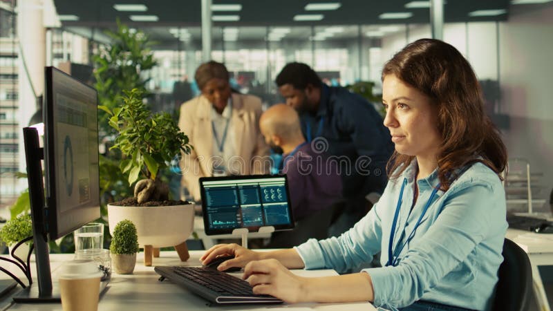 Employee at Office Desk Typing on Keyboard, Editing Documents on ...