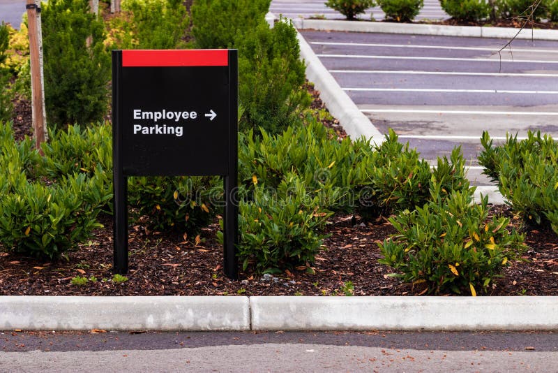 Employee Parking Sign in a Parking Lot with Arrow Stock Image - Image ...
