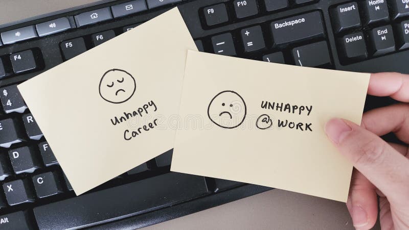 Employee Picking Up a Note Showing Unhappiness at Work. Unhappy Career ...