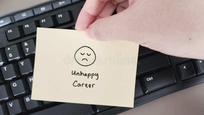 Employee Picking Up a Note Showing Unhappiness at Work. Unhappy Career ...
