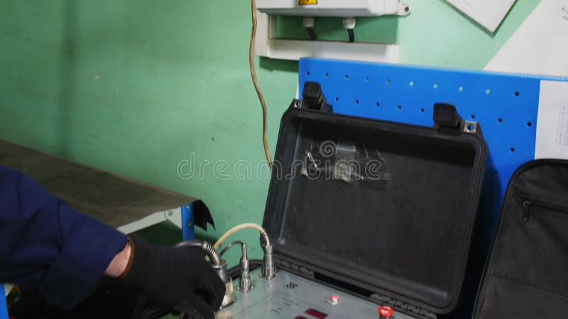 Employee Presses Button on Control Panel of Machine at Plant Stock ...