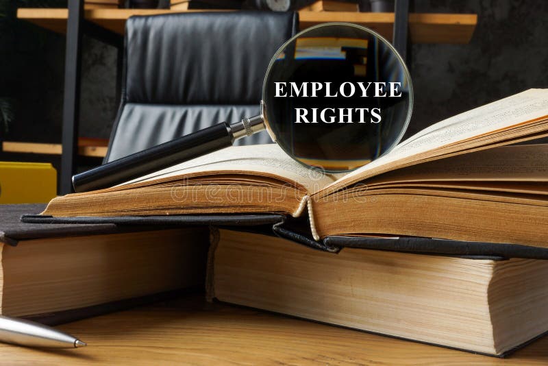 Employee Rights Concept. Open Books and Magnifying Glass. Stock Photo ...