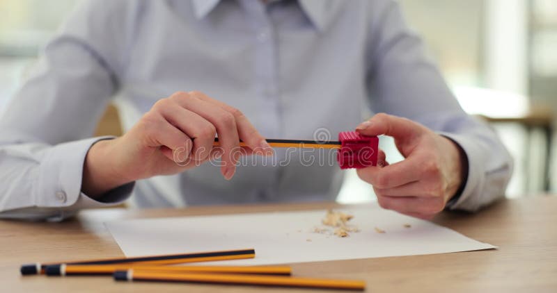 Employee Sits at Table with Pencil and Sharpener Stock Footage - Video ...