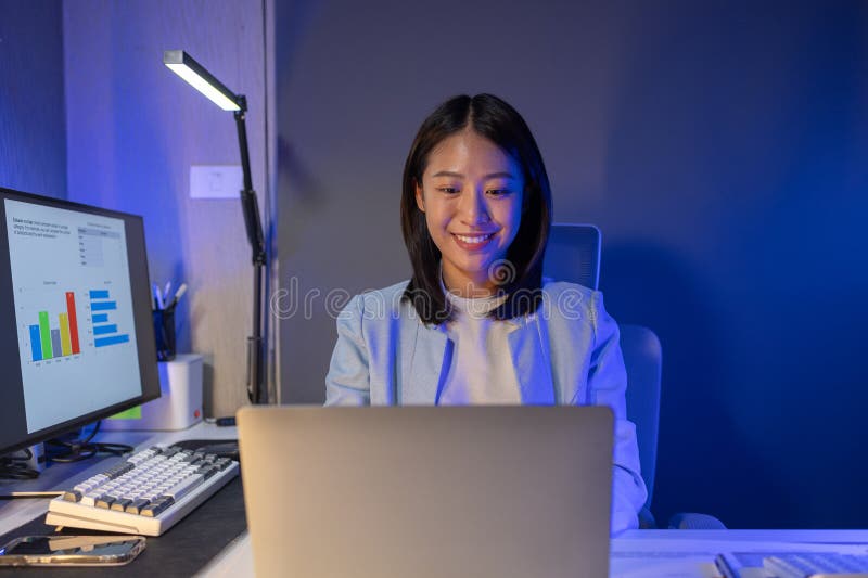 An Employee is Sitting in a Personal Office Doing Work Assigned by a ...