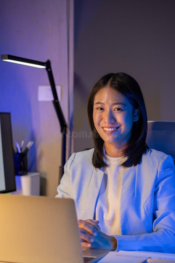 An Employee is Sitting in a Personal Office Doing Work Assigned by a ...