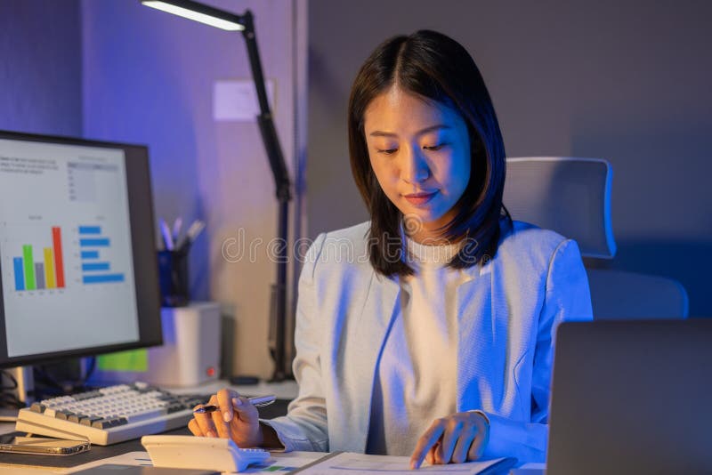 An Employee is Sitting in a Personal Office Doing Work Assigned by a ...