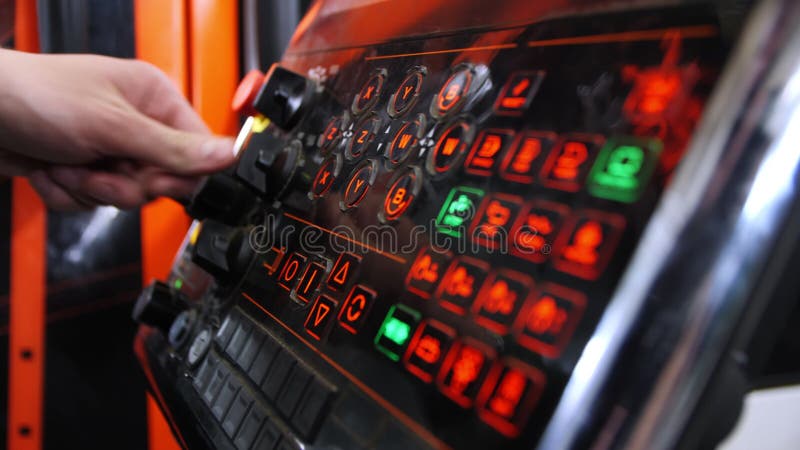 Employee Turns Handles on Control Panel Tuning Machine Tool Stock ...