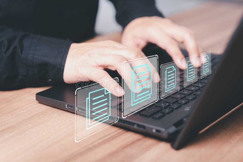 Employee Typing on a Computer Keyboard Checking Documents in Office ...