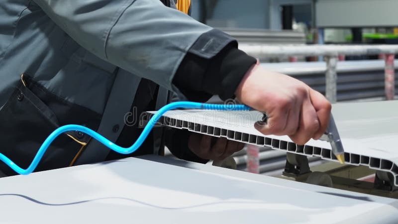 Employee Removes Particles from Windowsill Profiles with Air Stock ...