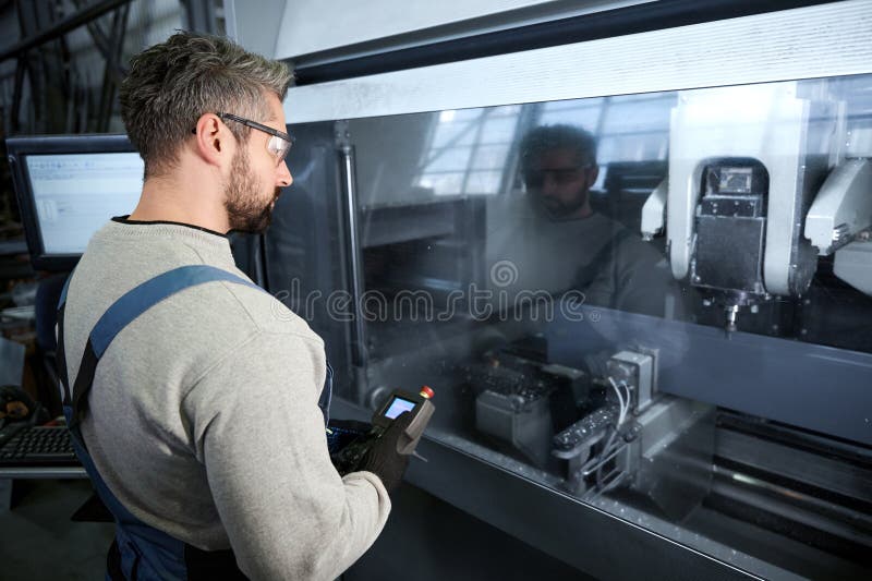 Employee Uses a Control Panel To Work on Modern Equipment Stock Image ...