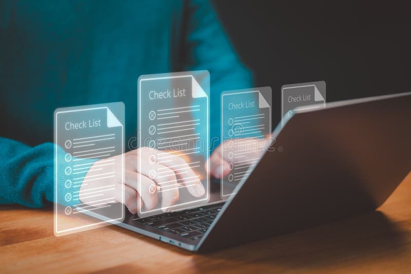 Employee Using a Computer Laptop Making Online Checklist Survey Stock ...