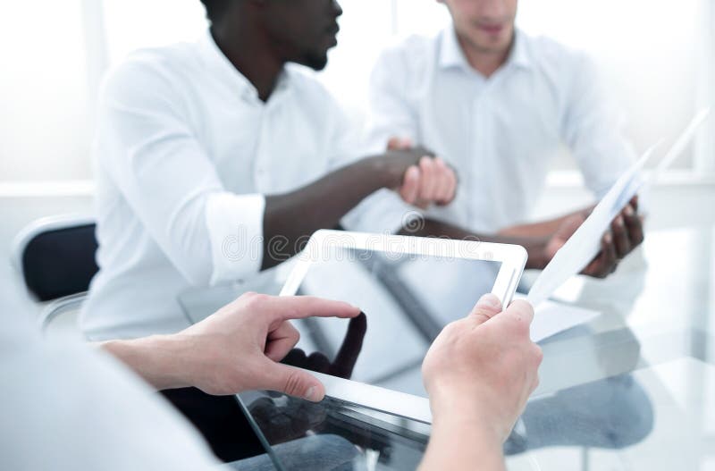 Employee Using a Digital Tablet at the Workplace. Stock Image - Image ...