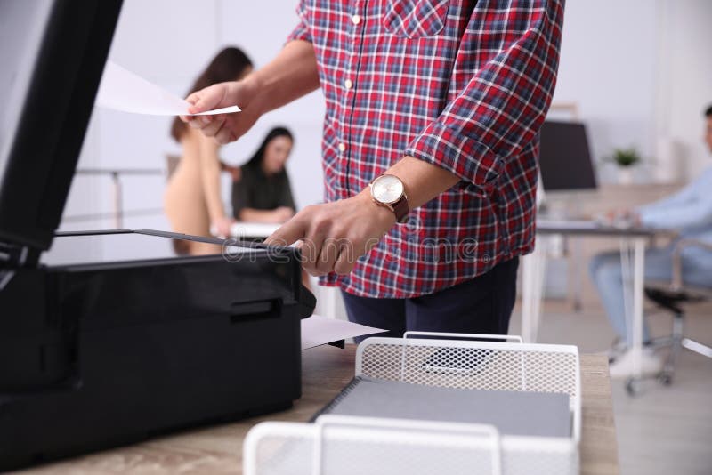 Employee Using Modern Printer in Office, Closeup Stock Photo - Image of ...