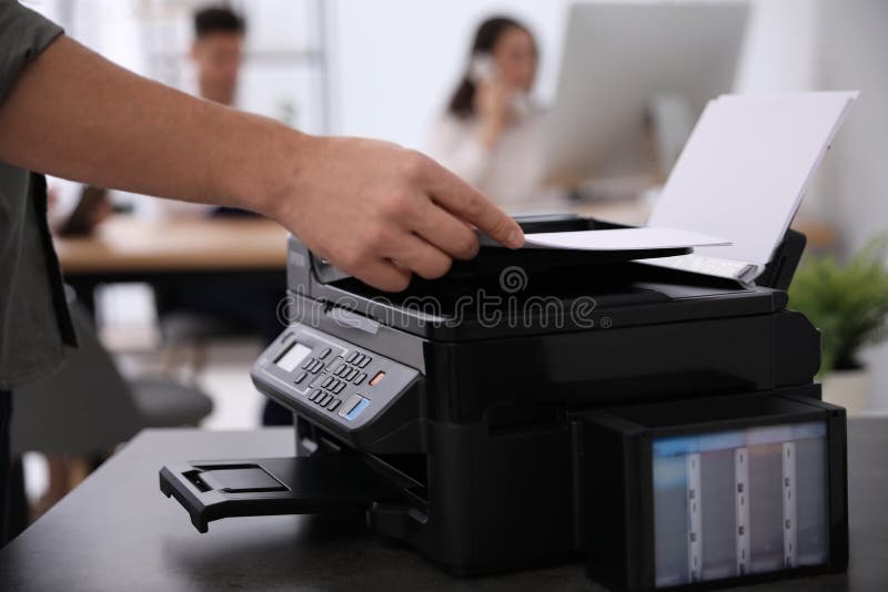 Employee Using Modern Printer in Office, Closeup Stock Photo - Image of ...