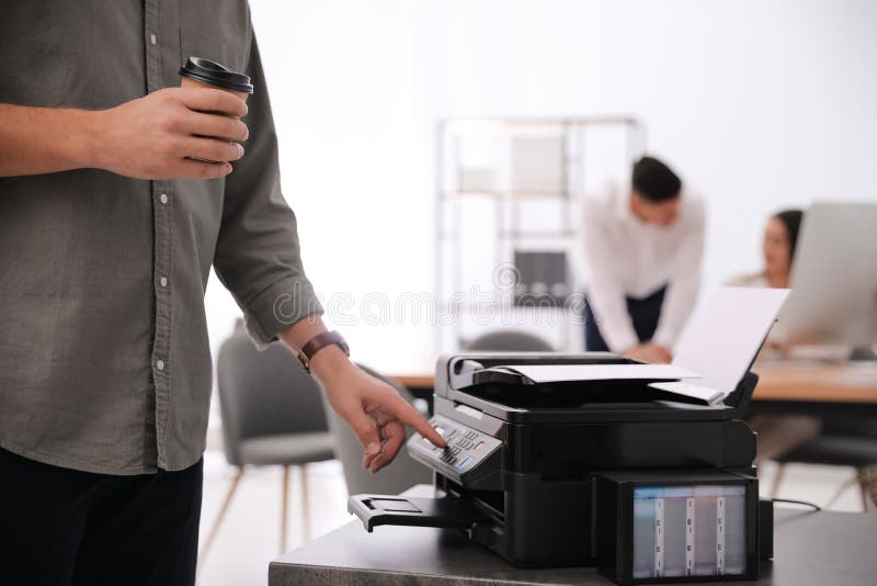 Employee Using Modern Printer in Office, Closeup Stock Photo - Image of ...