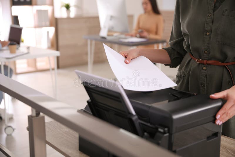 Employee Using Modern Printer in Office, Closeup Stock Image - Image of ...