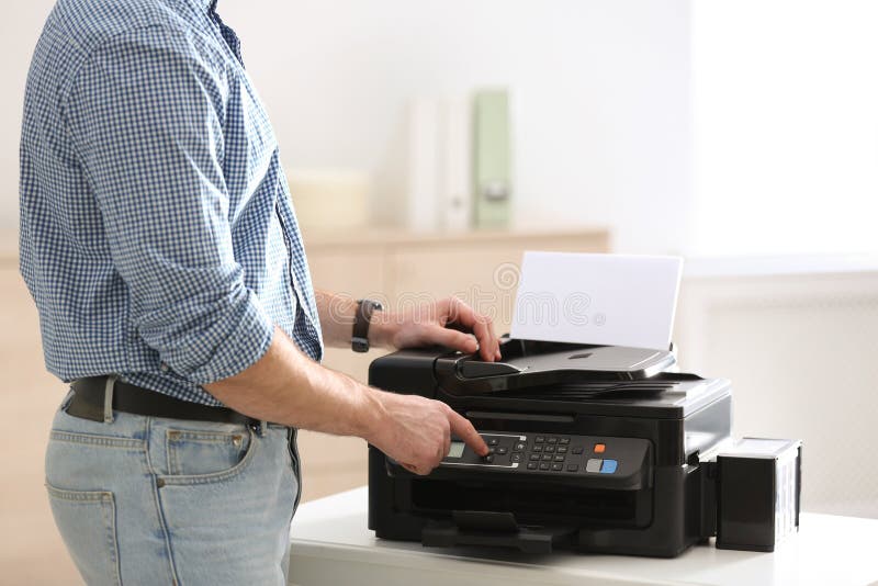 Employee Using Modern Printer in Office, Closeup Stock Photo - Image of ...