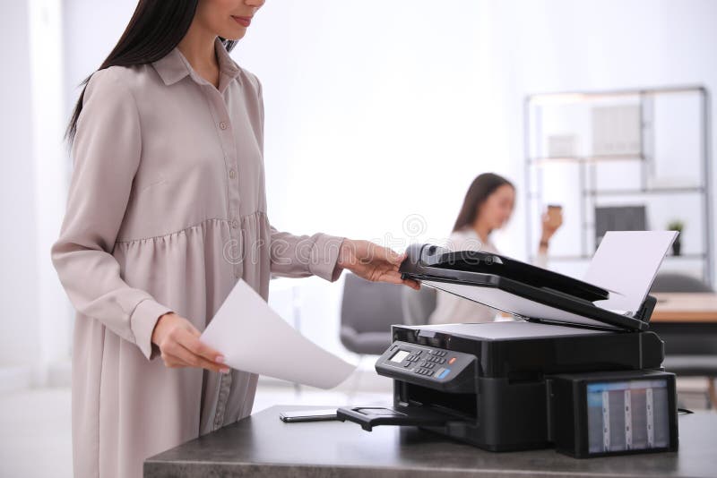 Employee Using Modern Printer in Office, Closeup Stock Photo - Image of ...