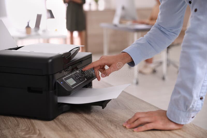 Employee Using Modern Printer in Office, Closeup Stock Image - Image of ...