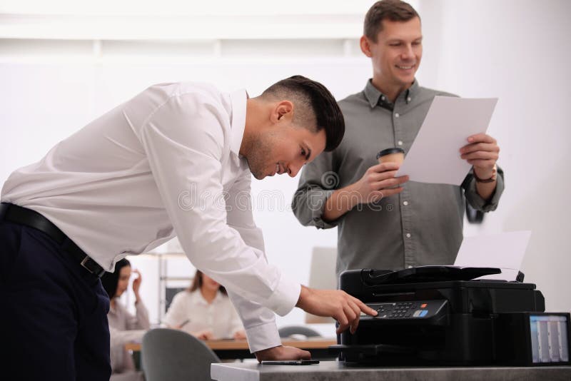 Employee Using New Modern Printer in Office Stock Image - Image of ...