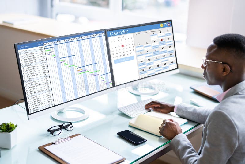 Employee Working on Calendar Schedule Stock Image - Image of reports ...