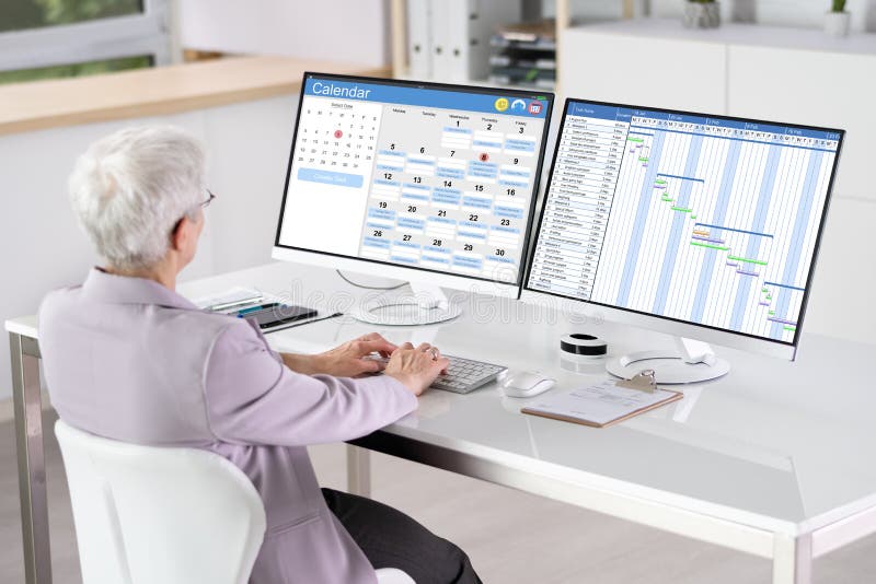 Employee Working on Calendar Schedule Stock Image - Image of device ...