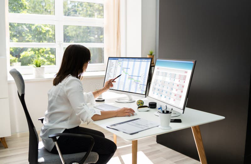 Employee Working on Calendar Schedule Stock Photo - Image of electronic ...