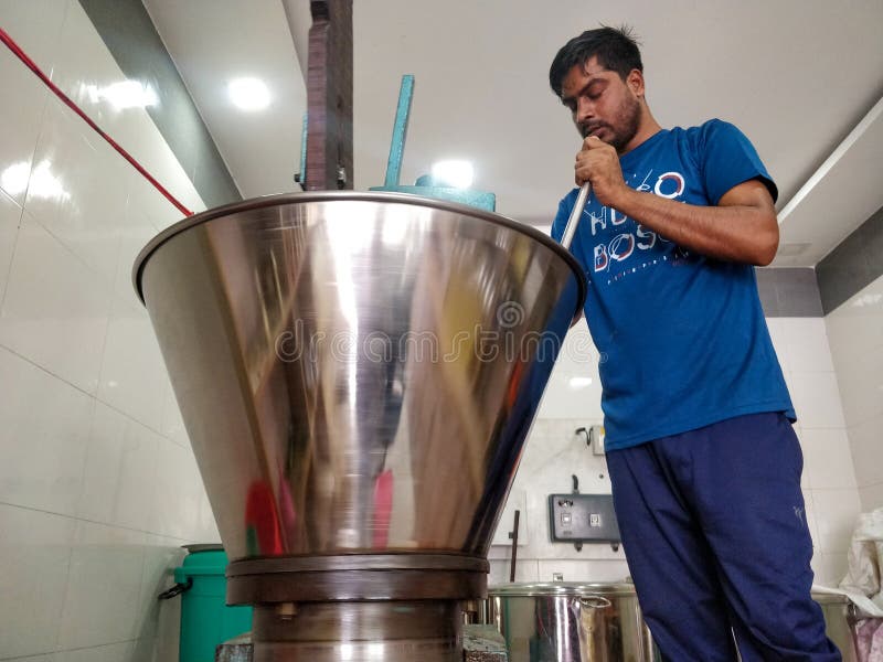 A Employee Working in Coconut Oil Extracting Machine Editorial Photo ...