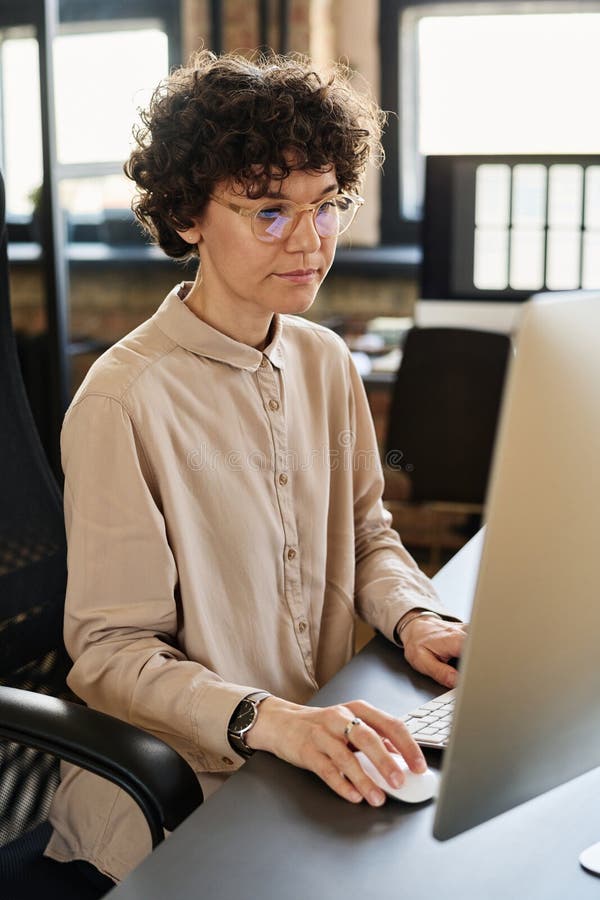 Employee Working on Computer at Office Stock Photo - Image of young ...
