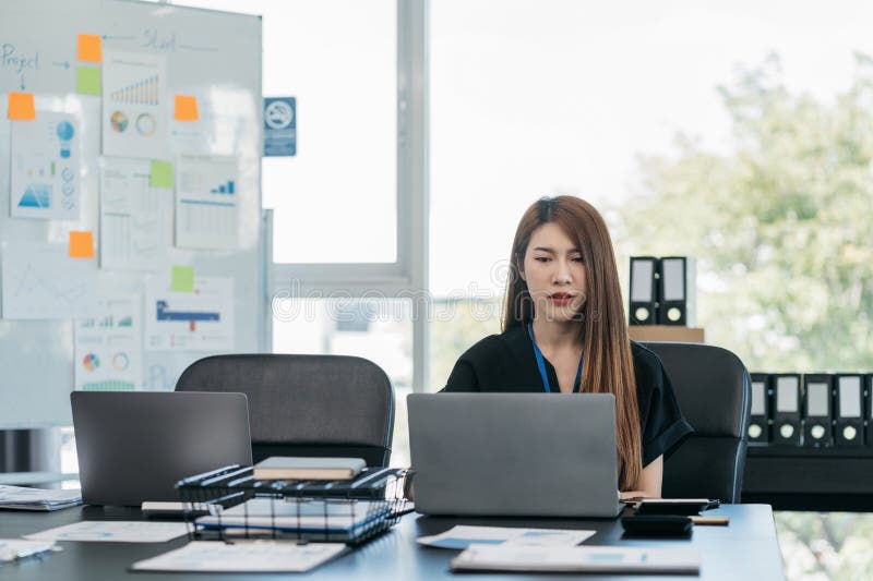 Employee, Working with Documents Sitting at Desk Using Laptop and ...