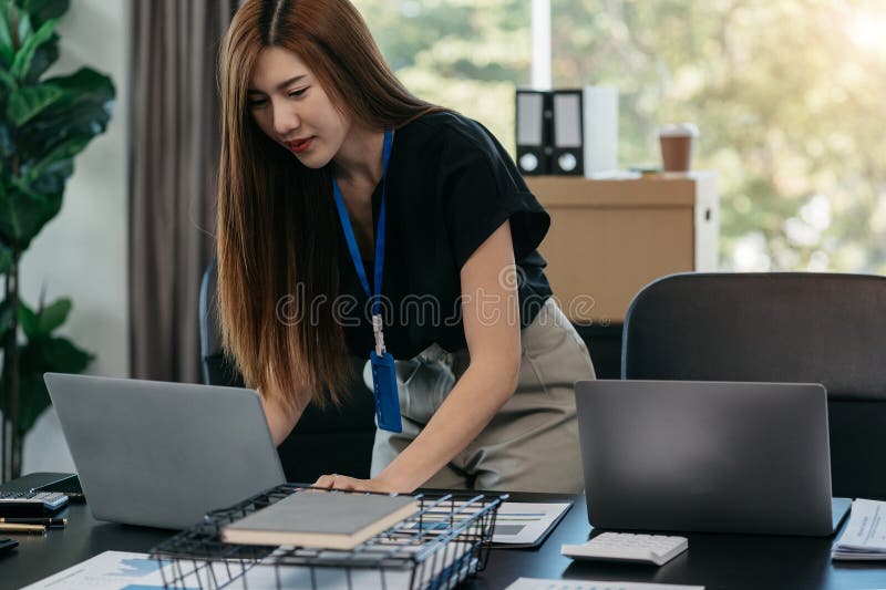 Employee, Working with Documents Sitting at Desk Using Laptop and ...