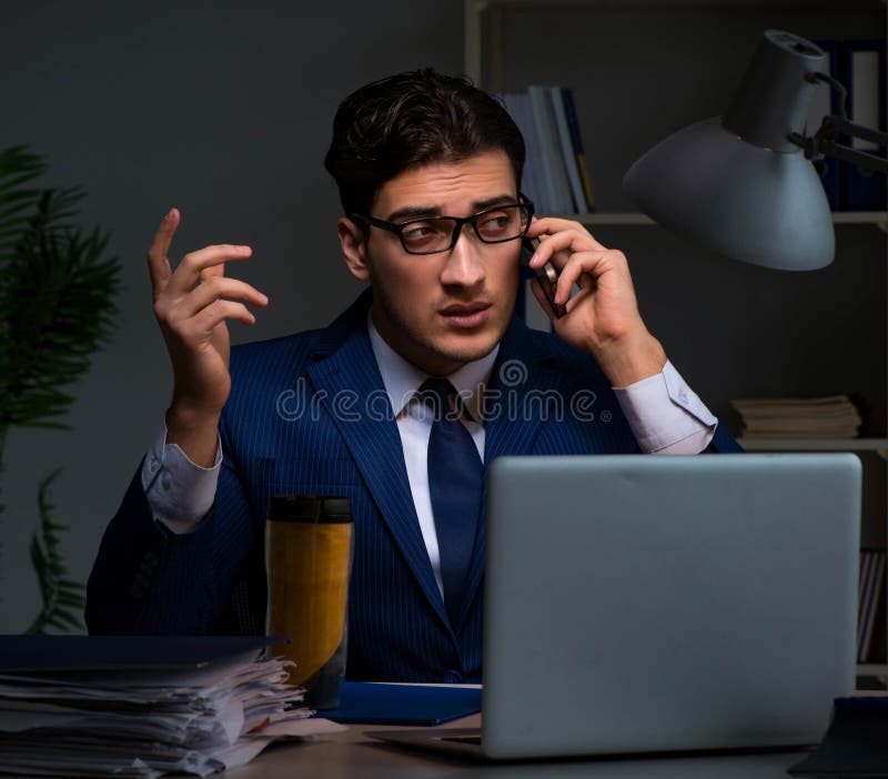 Employee Working Late To Finish Important Deliverable Task Stock Photo ...
